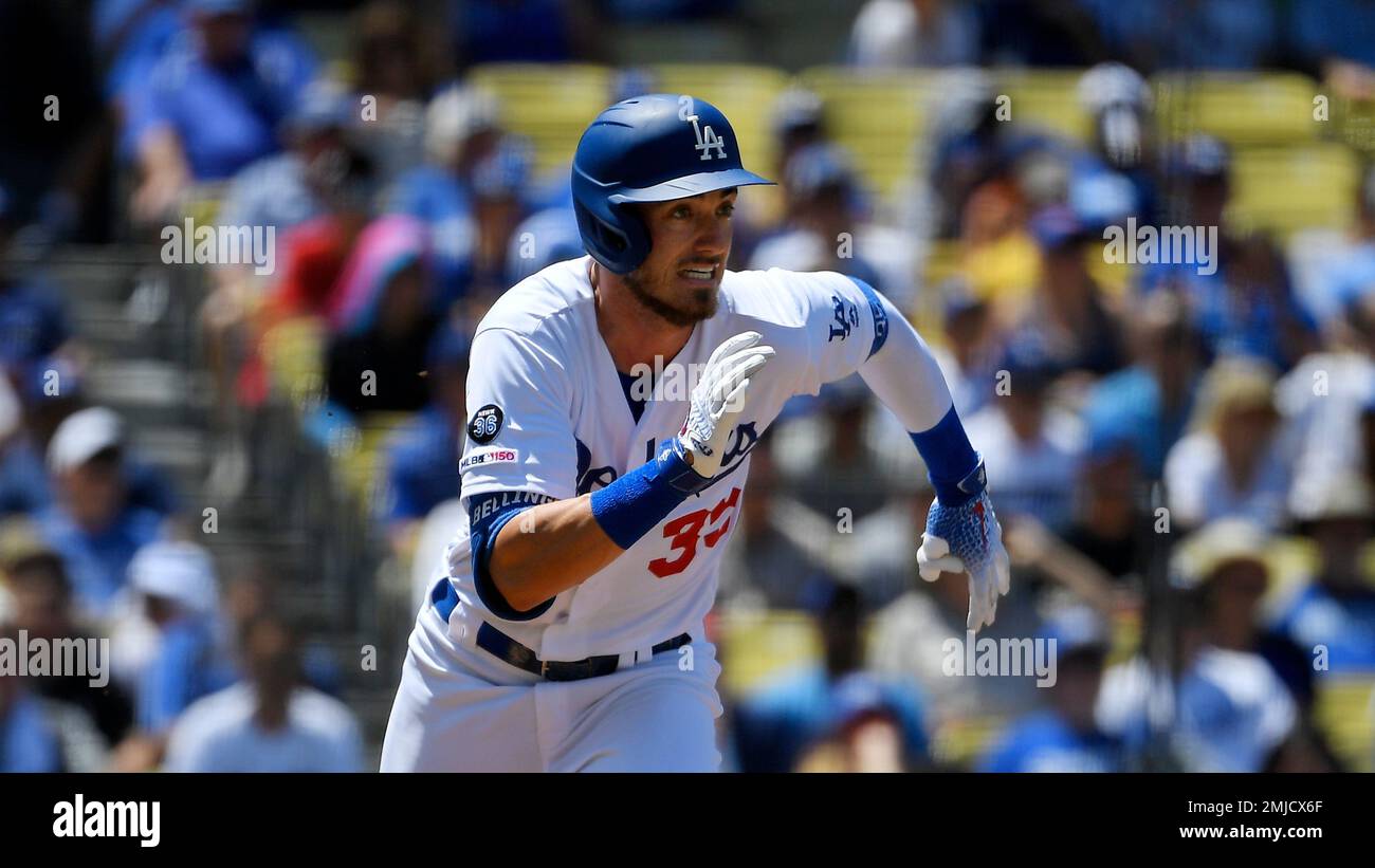 Los Angeles Dodgers' Cody Bellinger runs to first during a baseball ...
