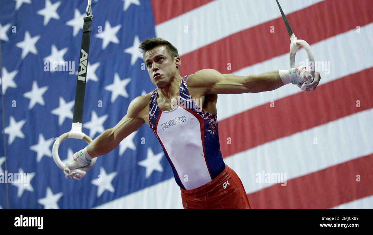 Samuel Mikulak competes on the rings during the senior men's ...