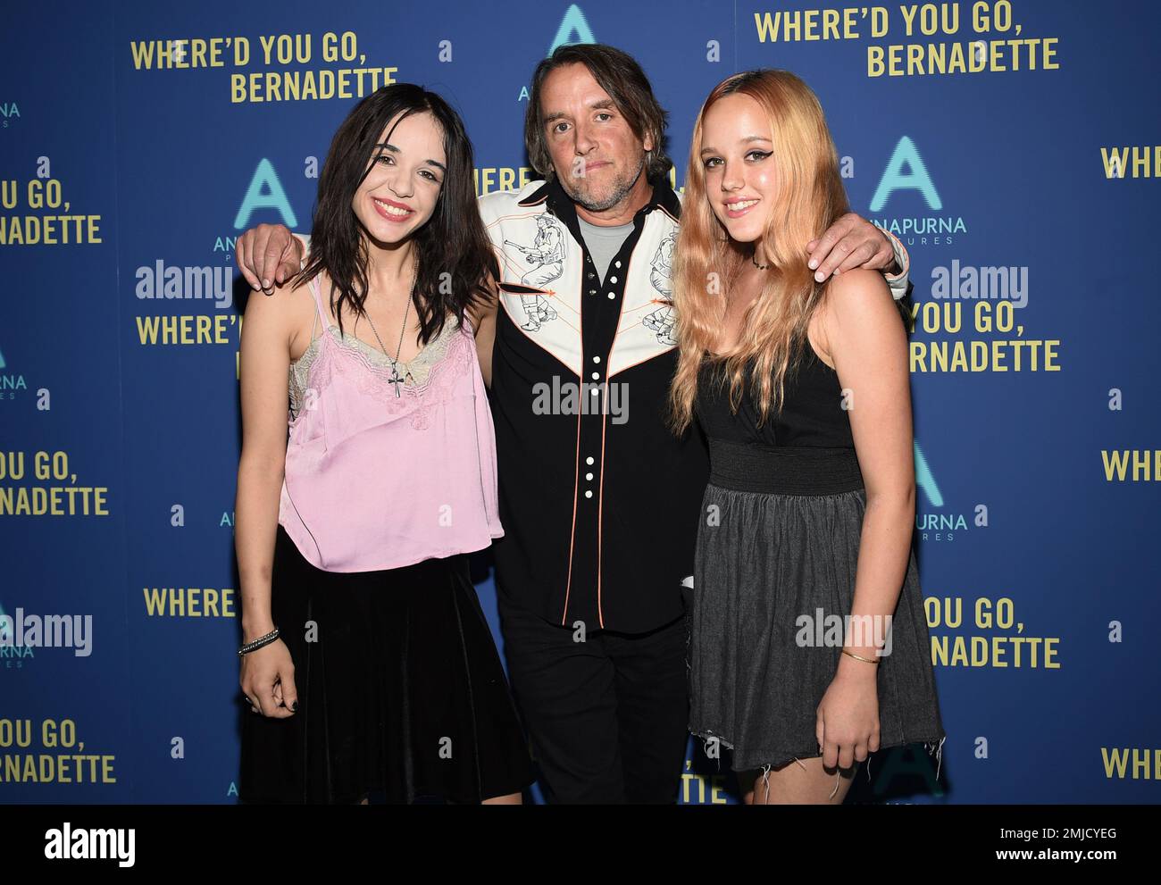 Director Richard Linklater, center, poses with daughters Lorelei ...