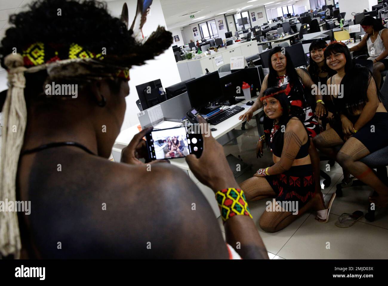 Indigenous women pose for photos as they occupy the Special ...