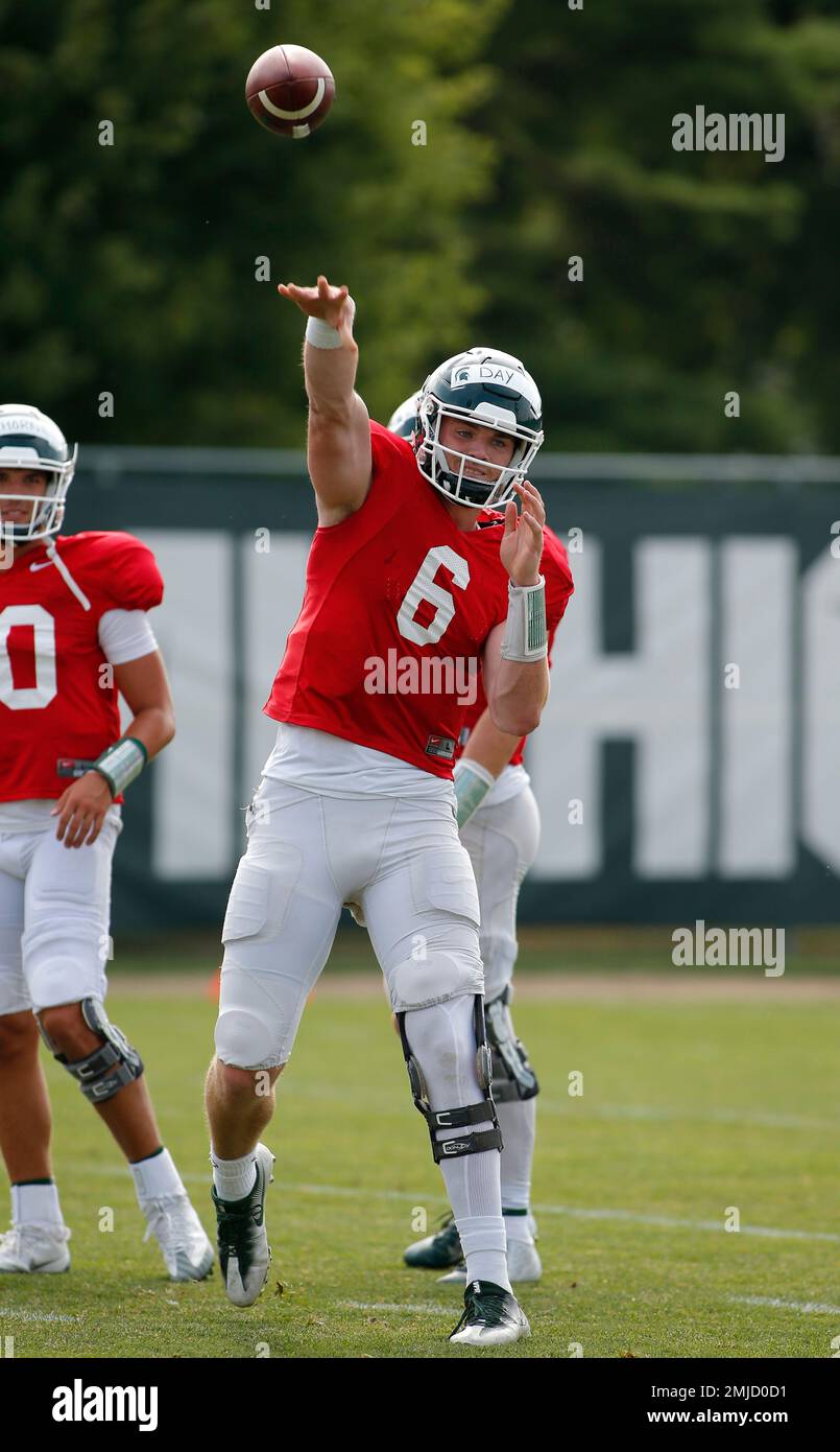 Michigan State quarterback Theo Day throws during an NCAA college ...