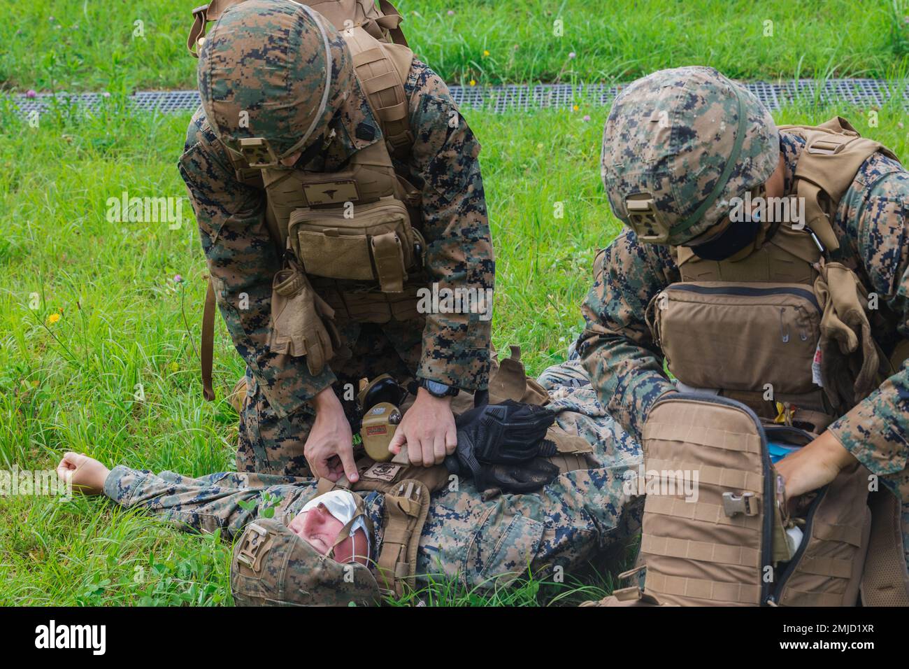 U.S. Navy Hospital Corpsman Chad Hearn (left), and Hospital Corpsman ...