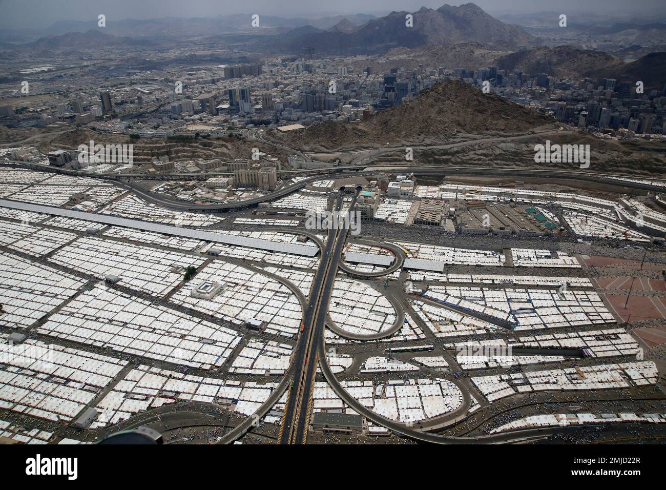 This aerial photo made from a helicopter shows tents for pilgrims ...