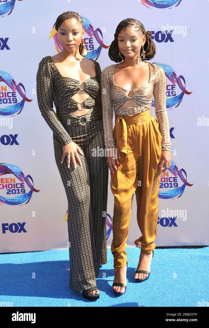 Chloe Bailey, left, and Halle Bailey arrive at the Teen Choice Awards ...
