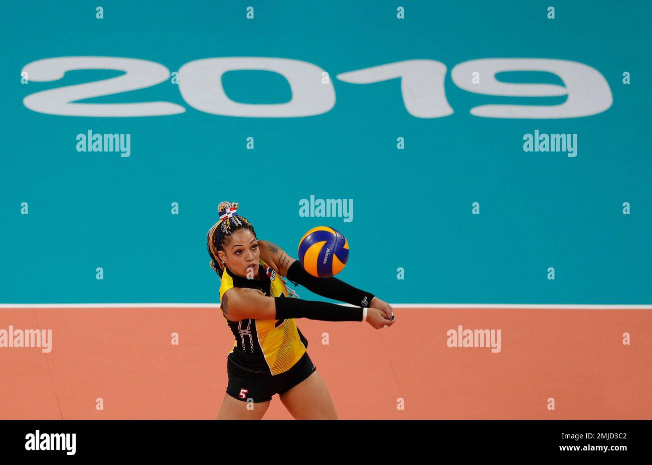 Brenda Castillo of the Dominican Republic bumps the ball her team plays ...