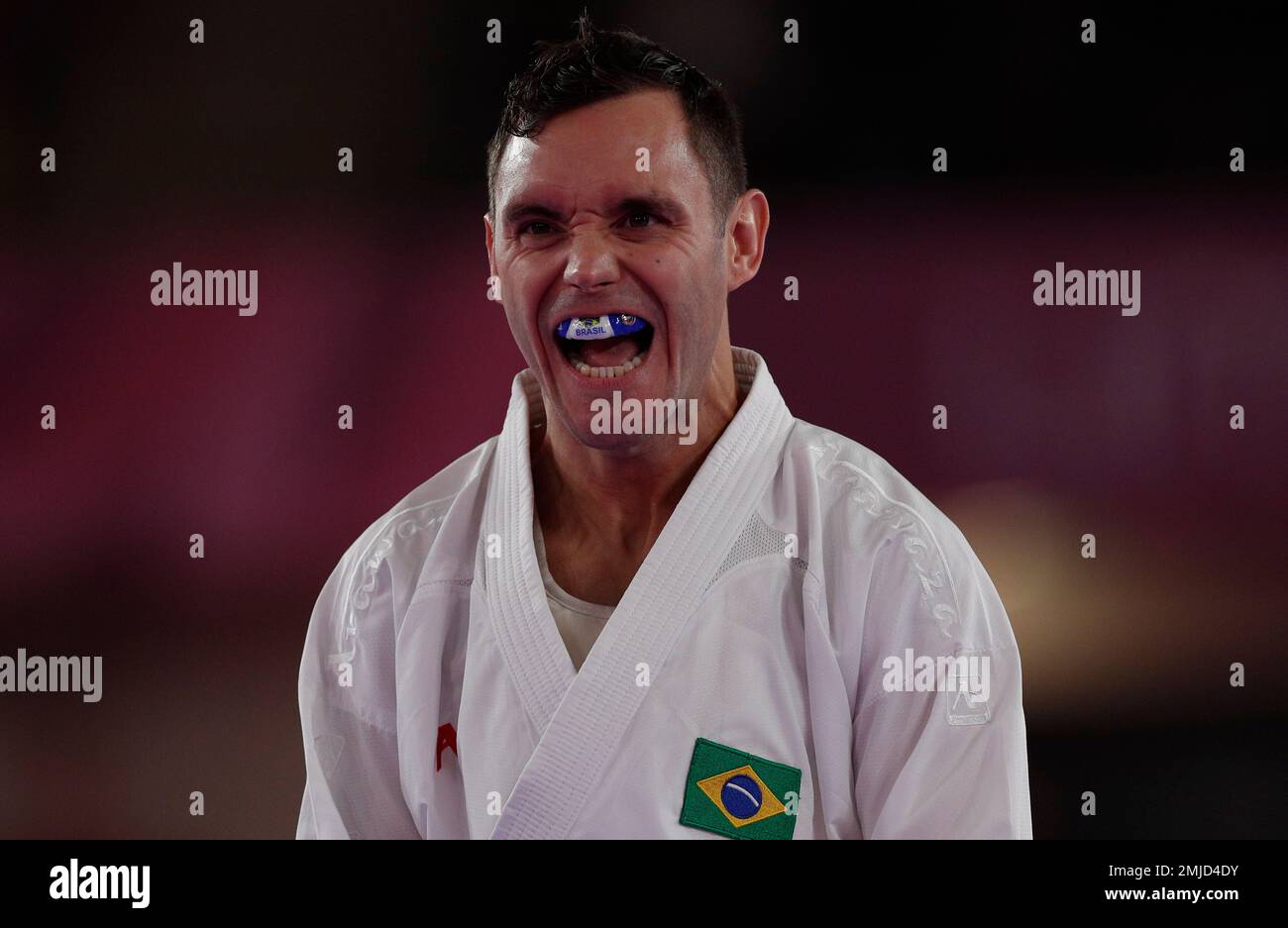 Douglas Brose of Brazil grimaces before competing against Andres Rendon ...