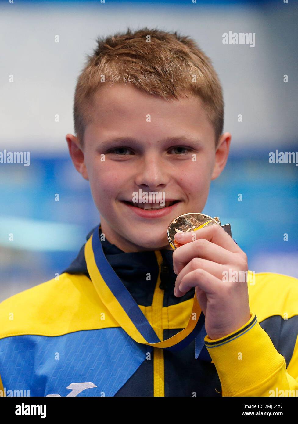 Ukraine's Oleksii Sereda, 13-year old, celebrates after winning the ...