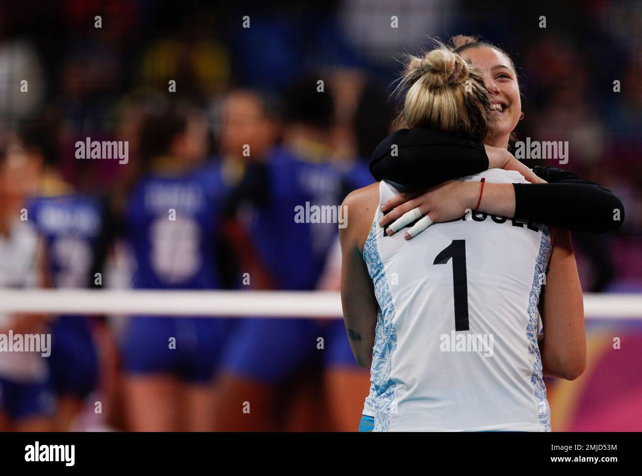 Argentina's Agnes Michel, right, hugs Elina Rodriguez after they won ...