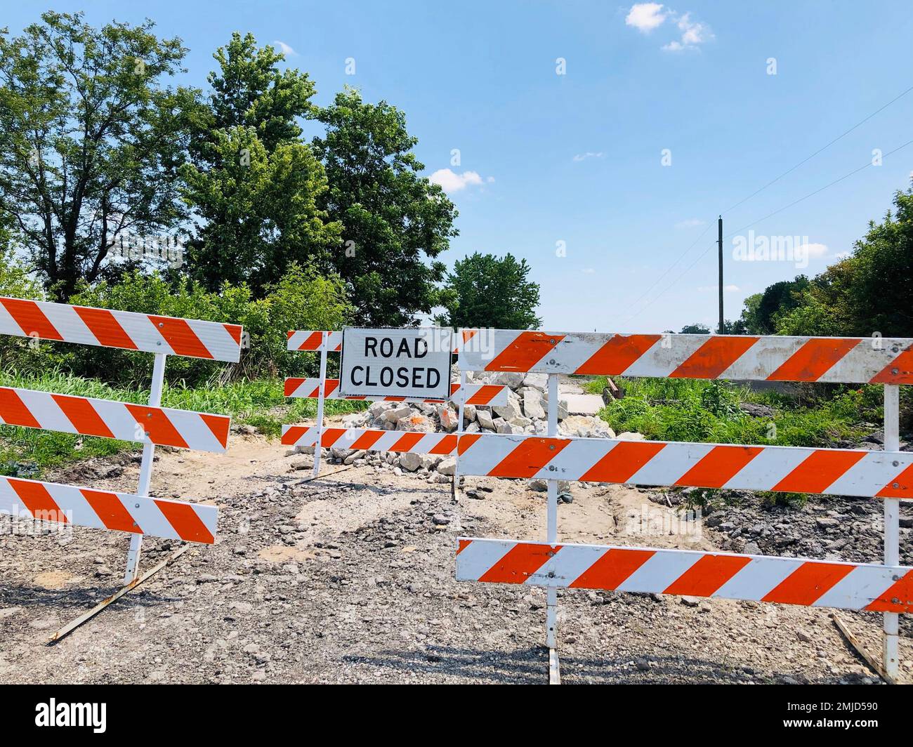 In this July 27, 2019, photo, signs block access to a bridge on a rural ...