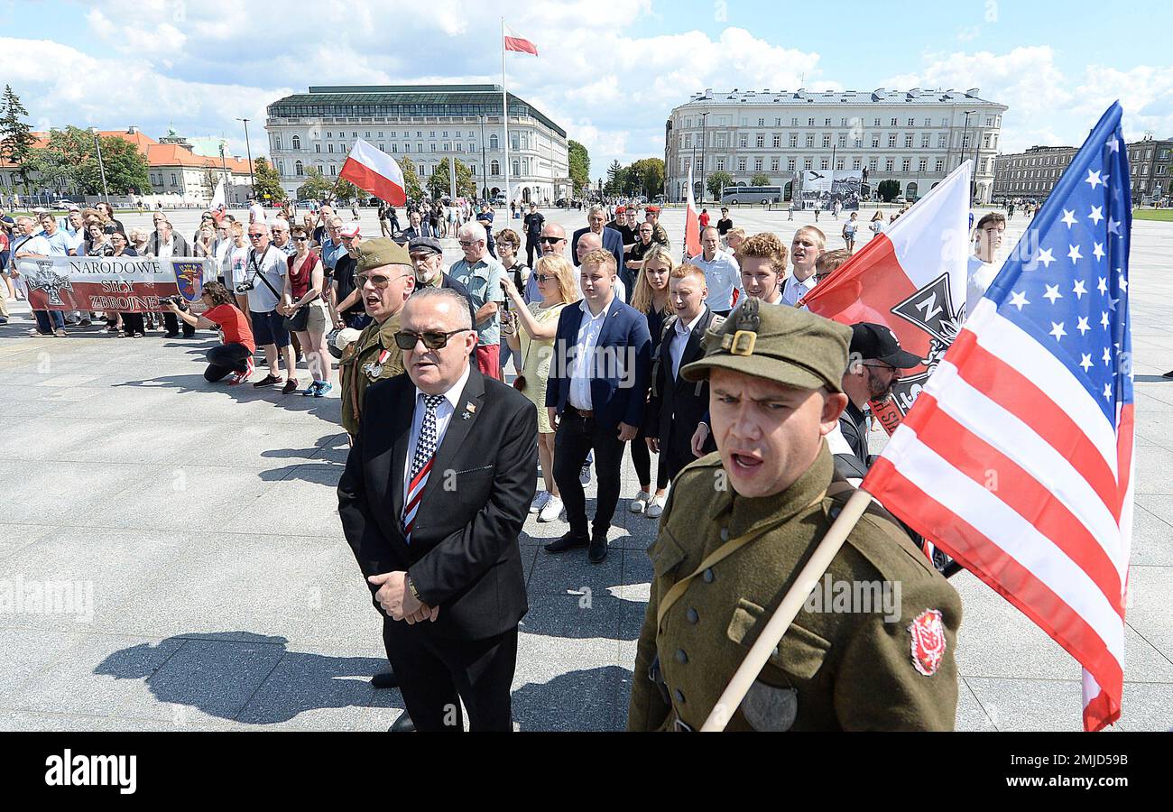 Polish officials and war veterans pay tribute to a World War II-era ...