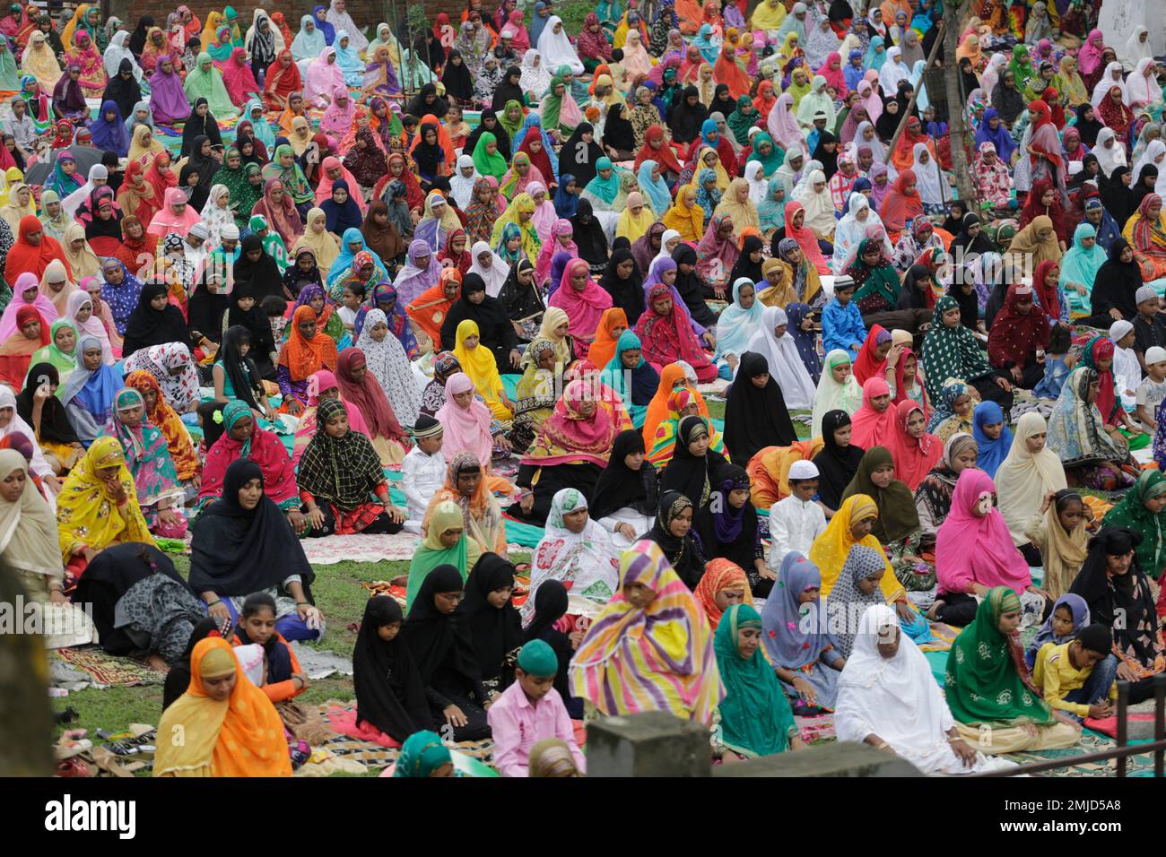Indian Muslim women participate in a special prayer ahead of Eid al ...