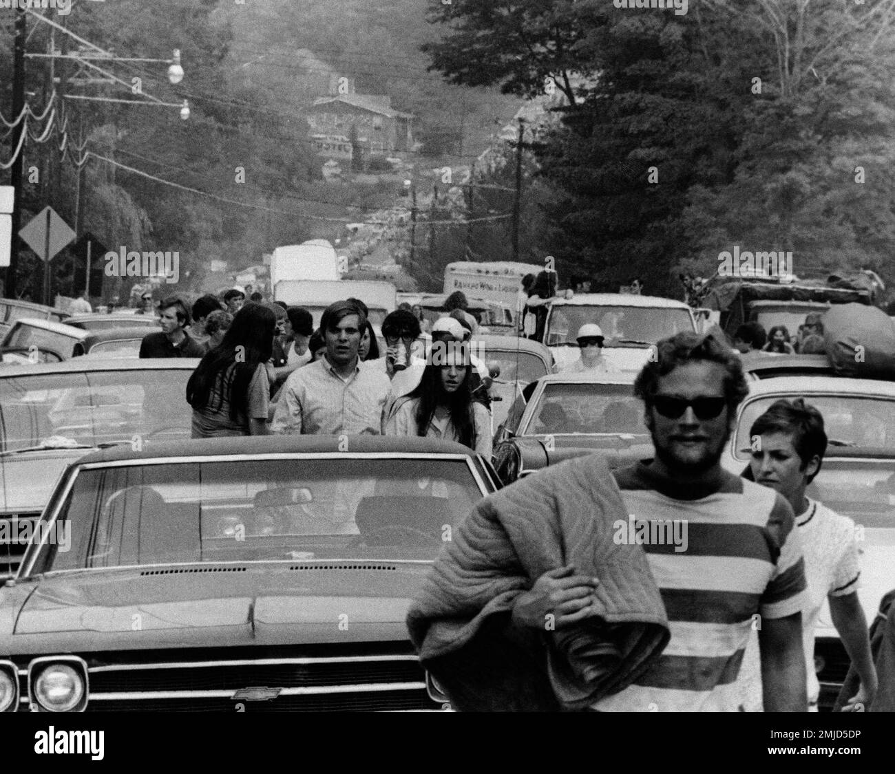 FILE -This Aug. 15, 1969 file photo shows people abandoning their ...