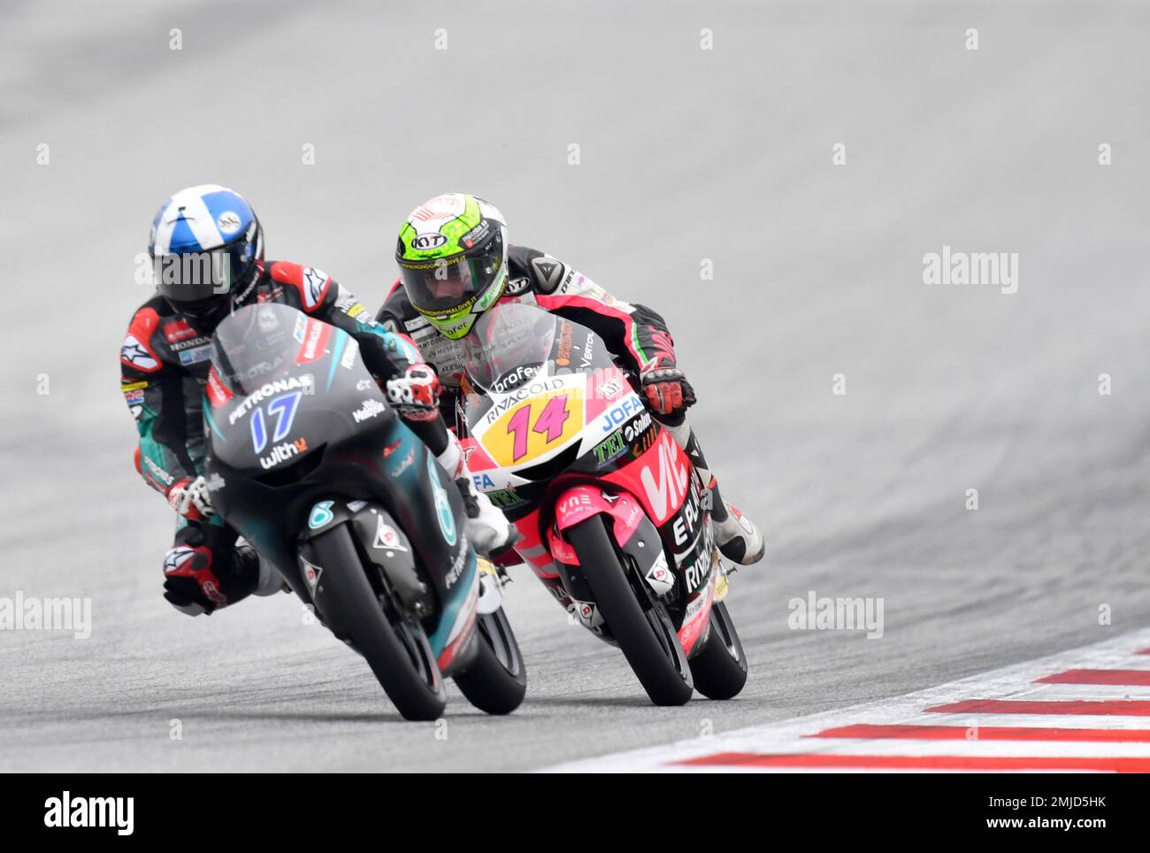 Britain's rider John Mcphee of the Petronas Sprinta Racing steers his ...