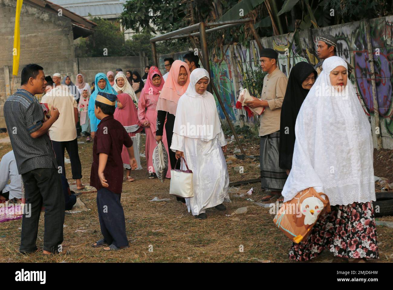 Muslima attend a morning prayer marking Eid al-Adha holidays at a ...