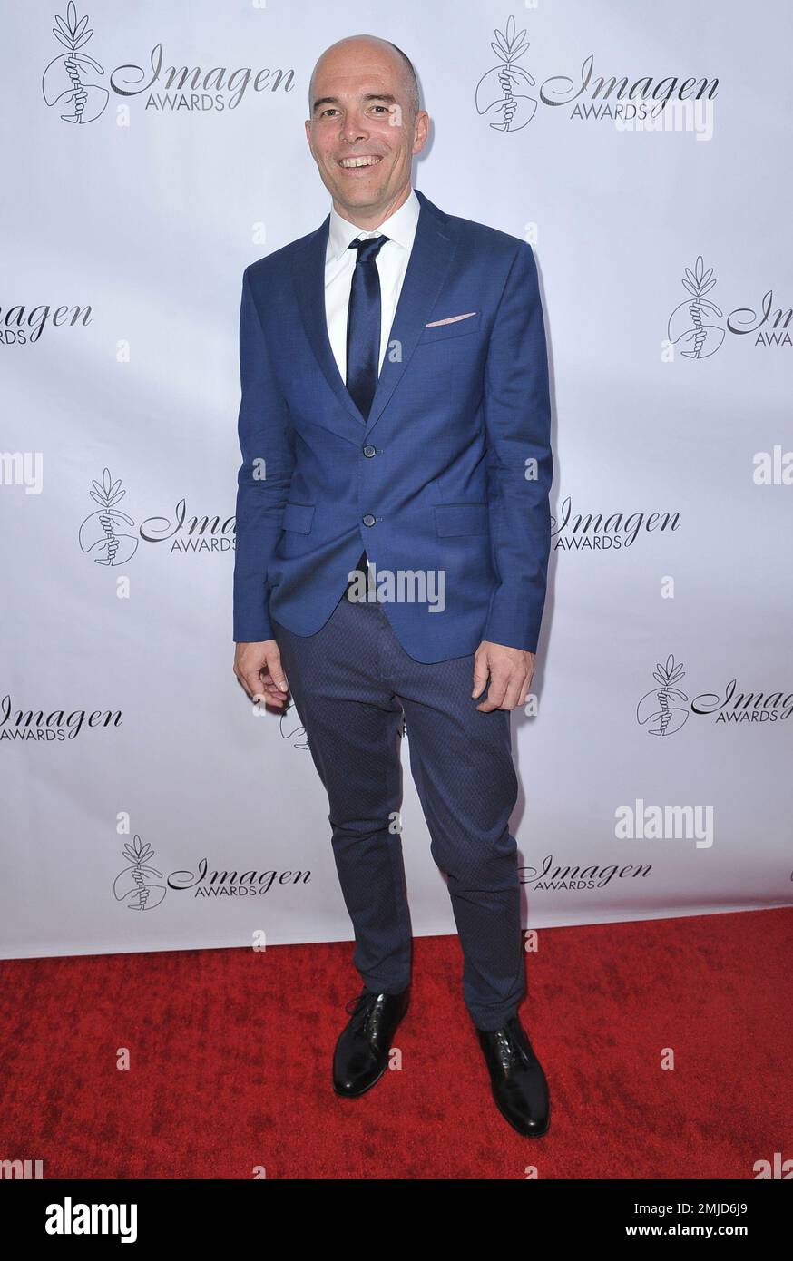 Casey Alexander arrives at the 34th annual Imagen Awards on Saturday ...