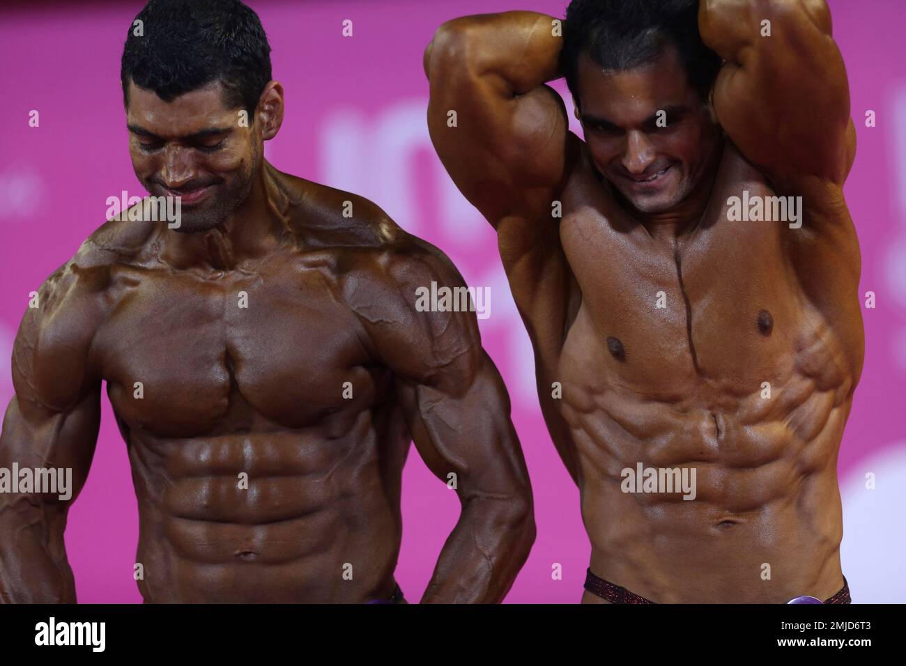 Villali Linarez of Venezuela, right, and Jorge Callejas of Nicaragua ...