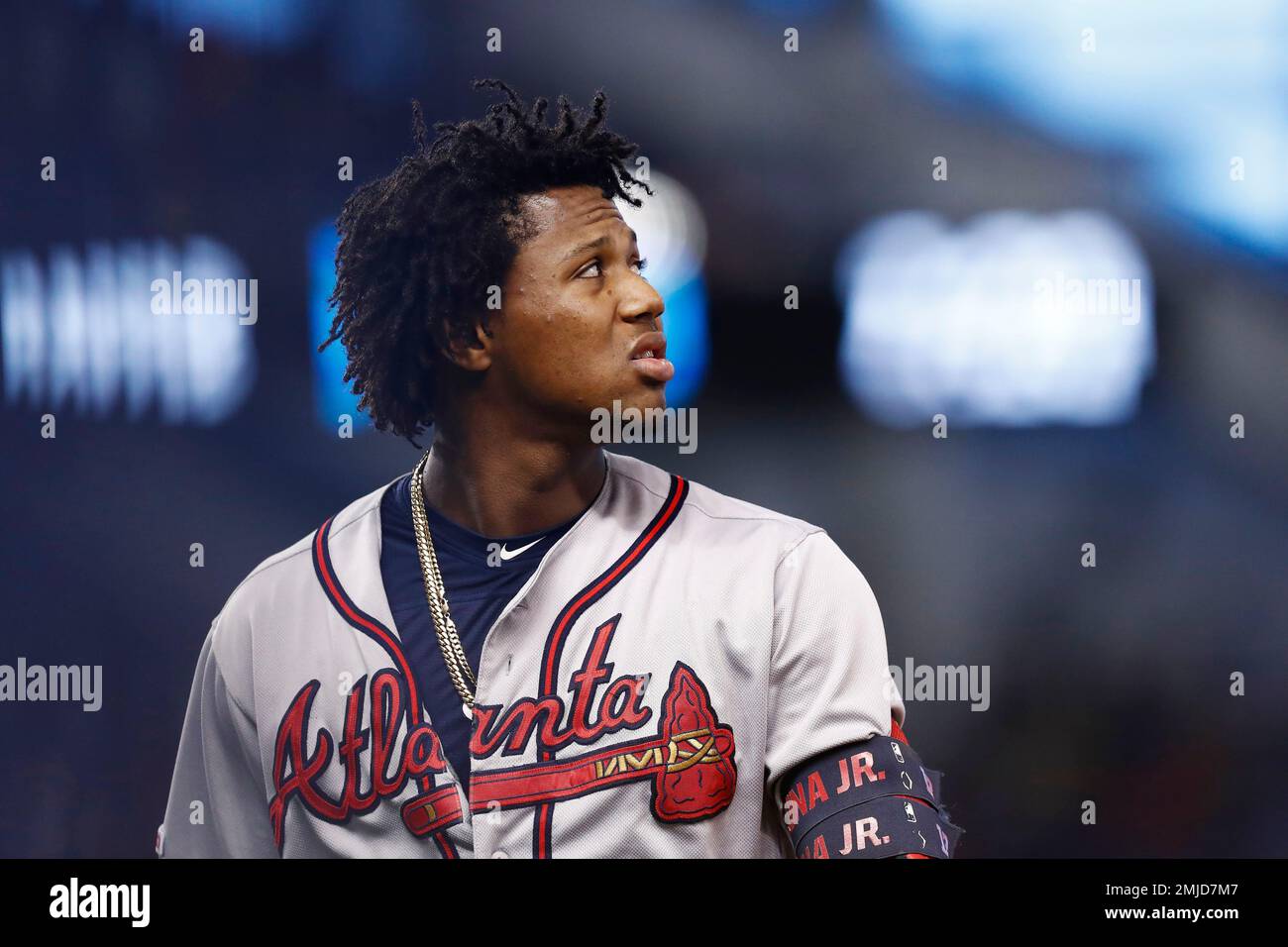 Atlanta Braves' Ronald Acuna Jr. walks off the field after hitting a ...