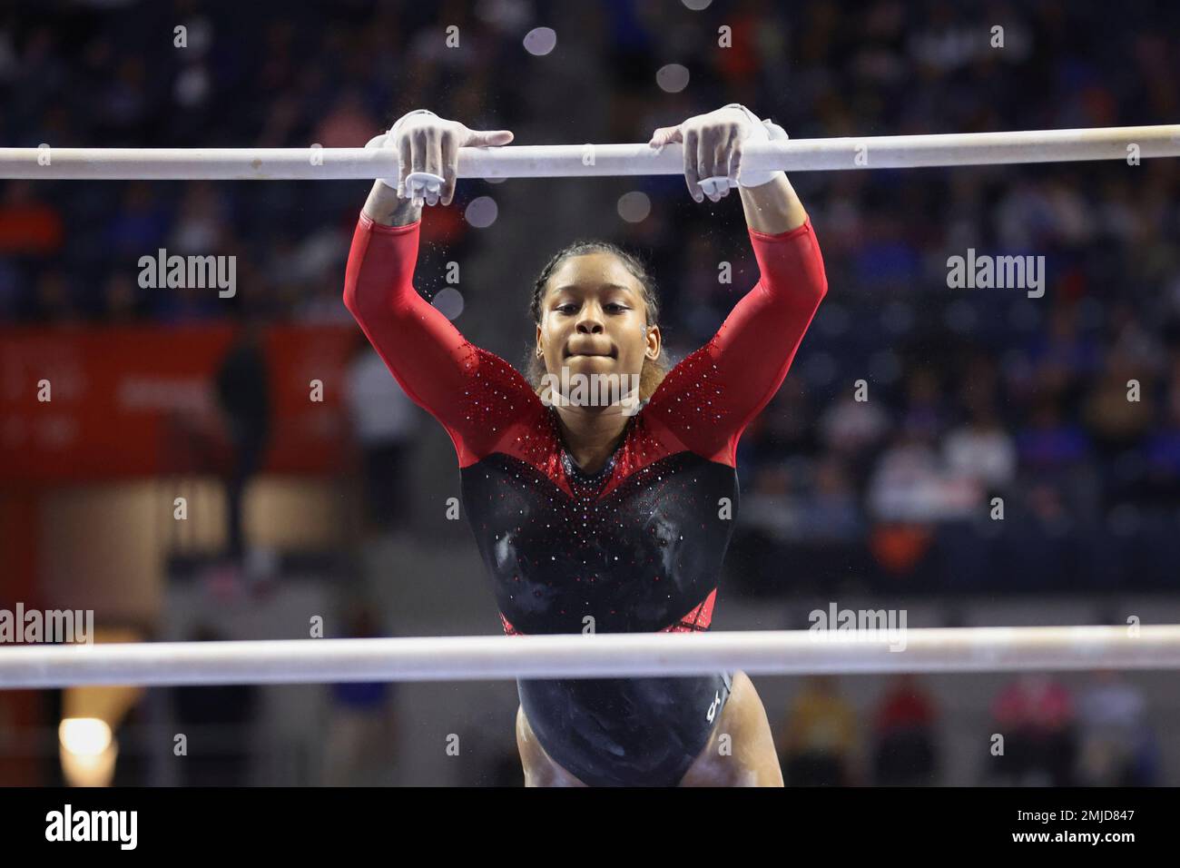 Georgia's Naya Howard competes on the uneven bars during an NCAA ...