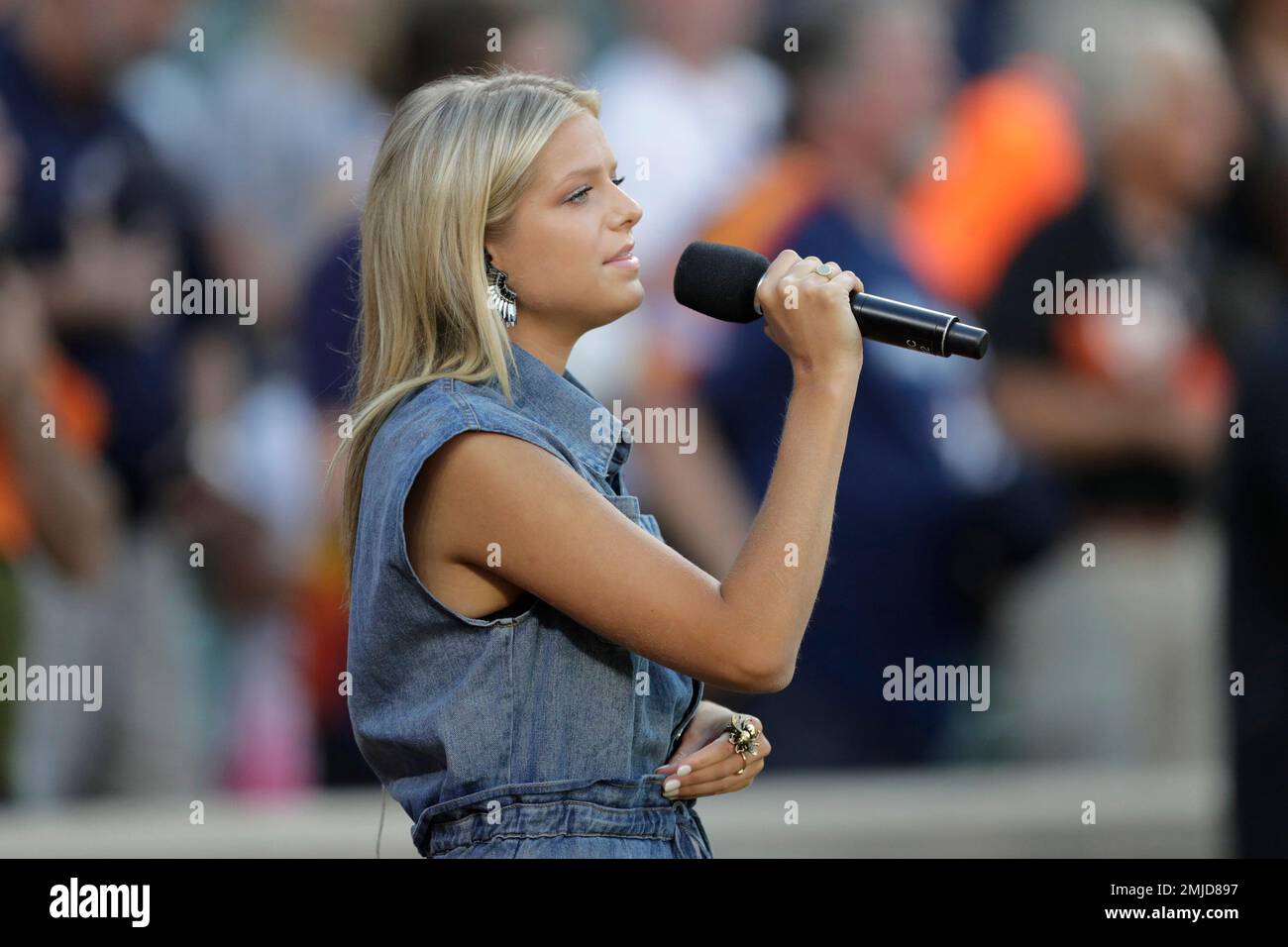 Country music singer Carter Faith sings the national anthem prior to a ...