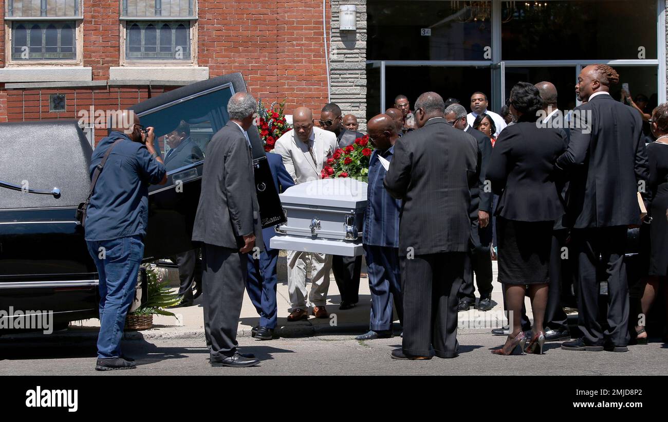 Derrick Fudge's casket is loaded into a hearse on Saturday, Aug. 10 ...