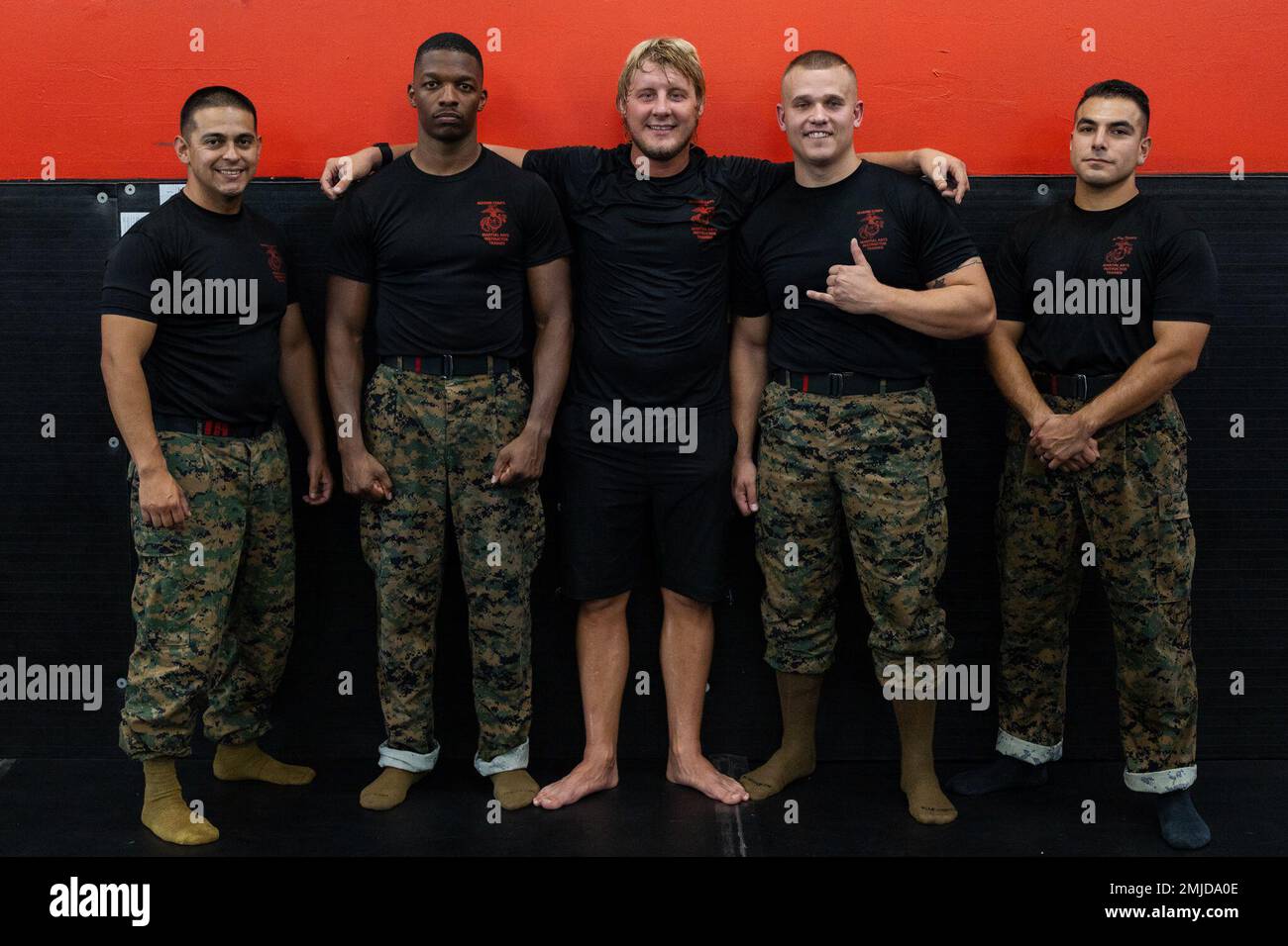 Paddy Pimblett, center, a mixed martial artist, poses with Marine Corps ...