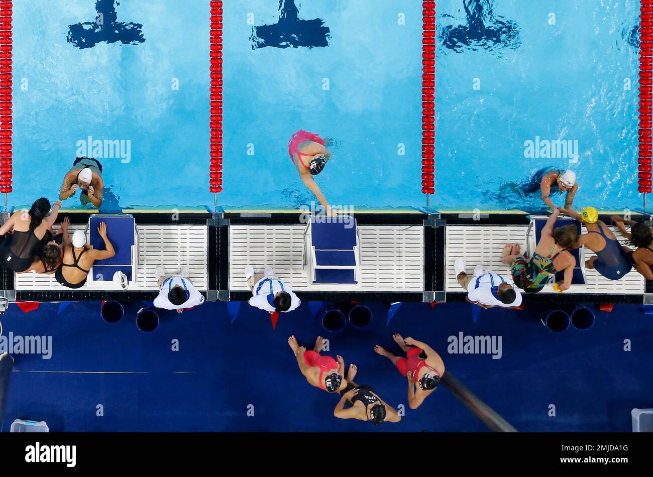 Meaghan Raab of the gold medal winning U.S. relay team recovers in the ...