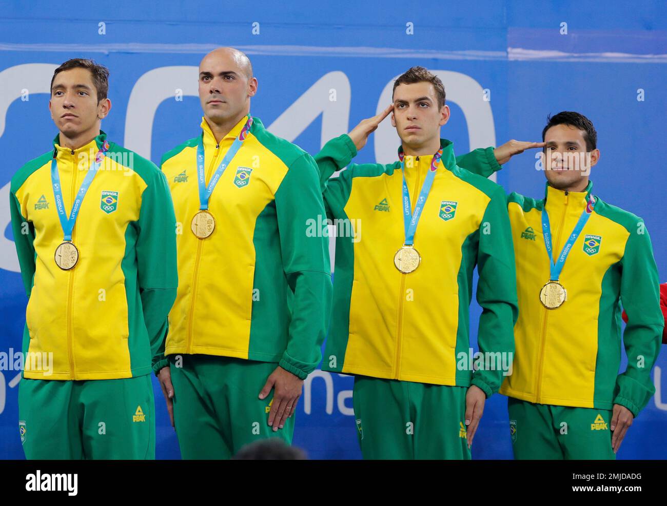 Brazil's swimming team sing their national anthem at the podium after ...