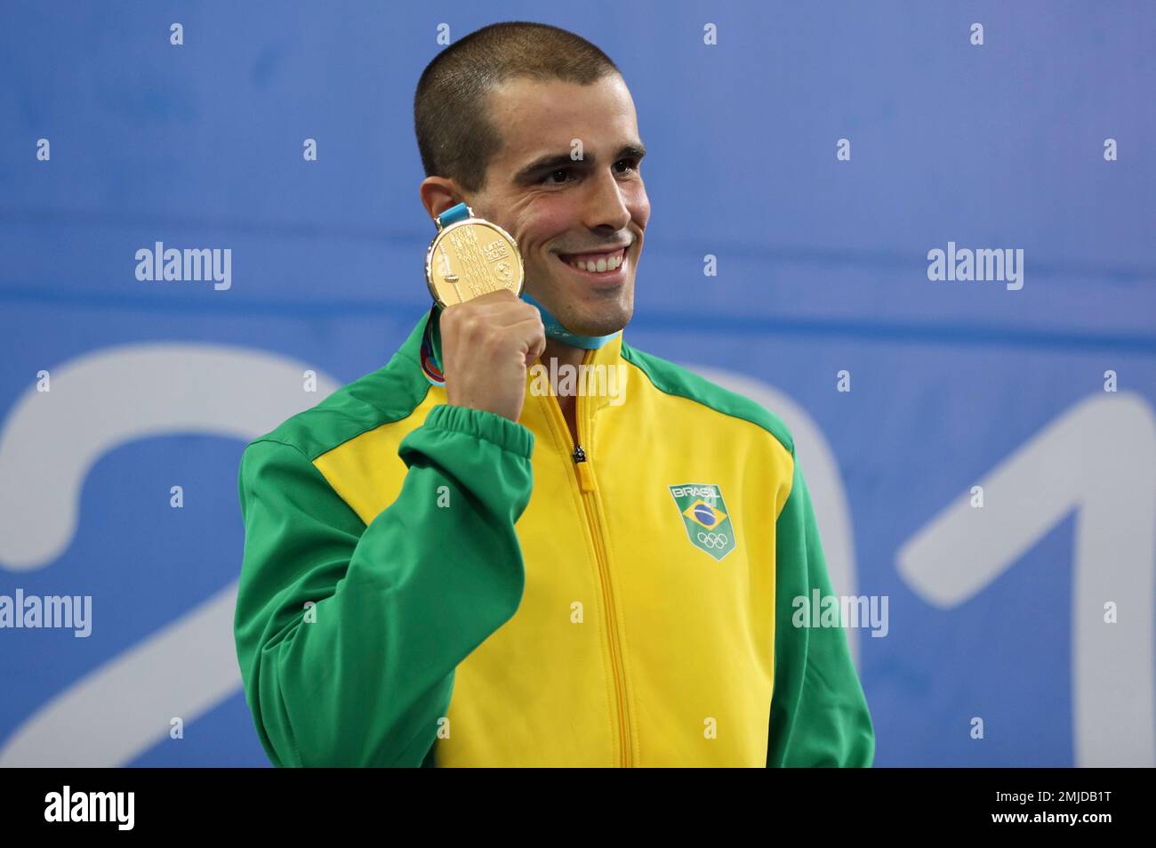 Bruno Giuseppe of Brazil holds up his gold medal at the medal ceremony ...