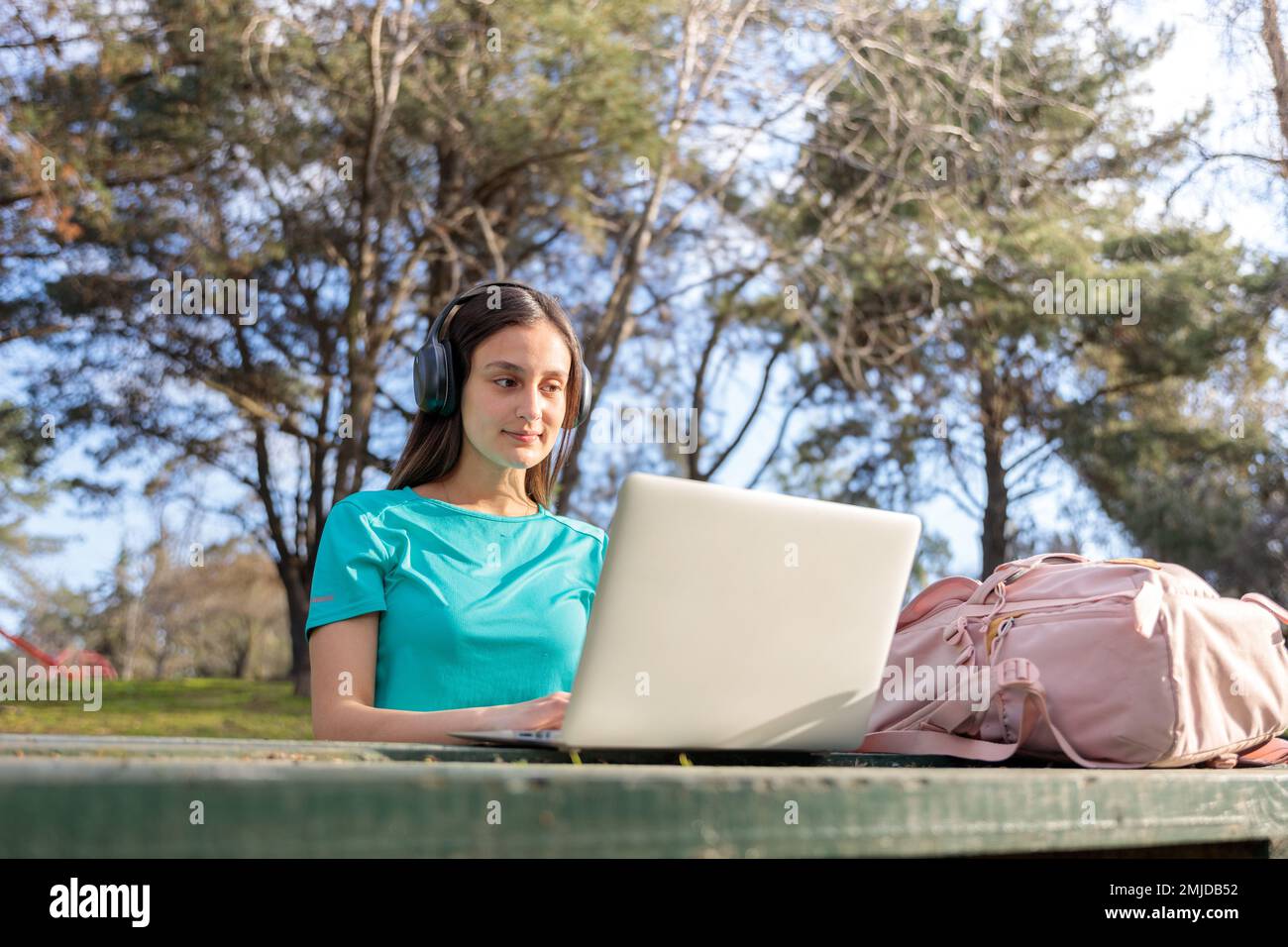 Woman studying in a park hi-res stock photography and images - Alamy