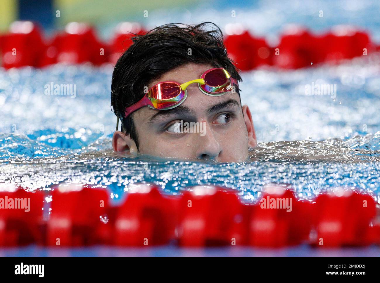 Chile's Moran Osorio swims to the edge of the pool after competing in a ...