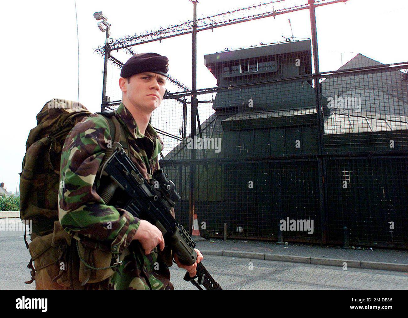 A British soldier patrols around Crossmaglen Army base, Northern ...