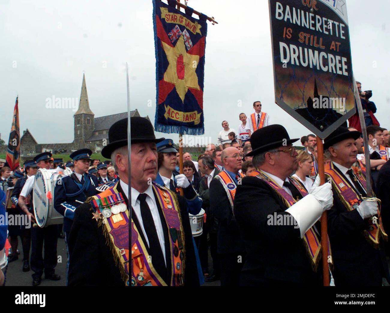 Portadown Orangemen march down to police lines after they were ...