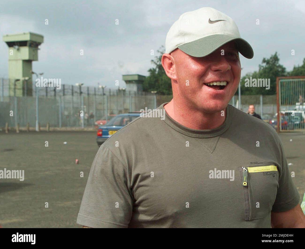 Ulster Freedom Fighters' leader Johnny Adair smiles as he arrives at ...