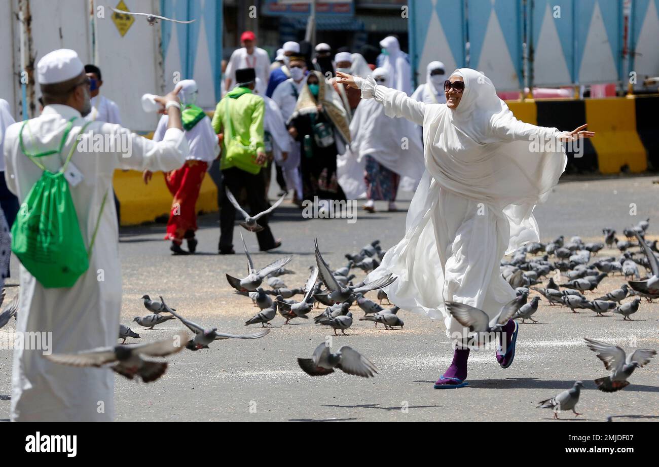 FILE - In this Sunday, Aug. 4, 2019 file photo, a Moroccan pilgrim runs ...
