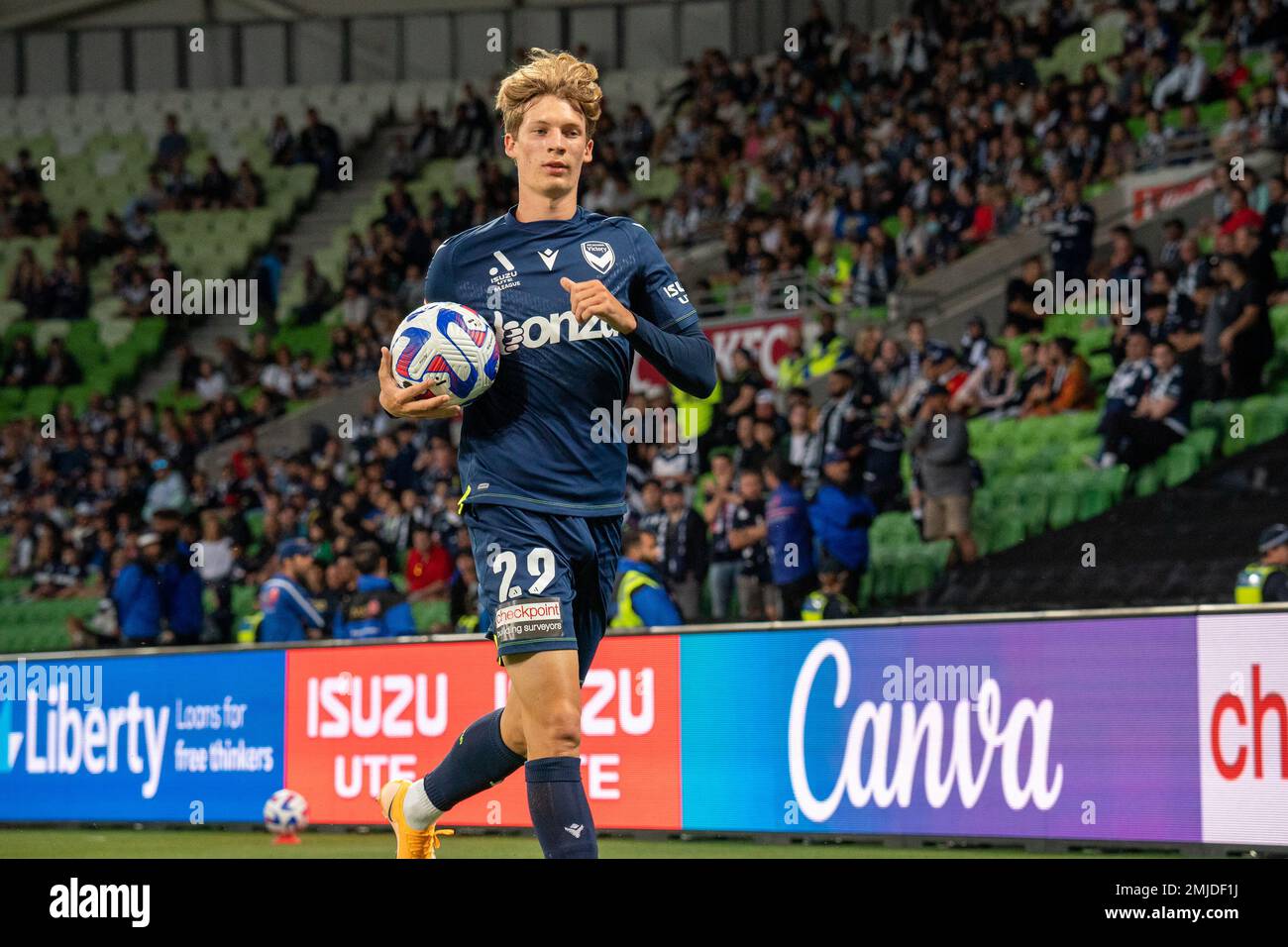 Melbourne, Australia. 26th January 2023. Melbourne Victory's Eli Adams prepares to take a corner ...