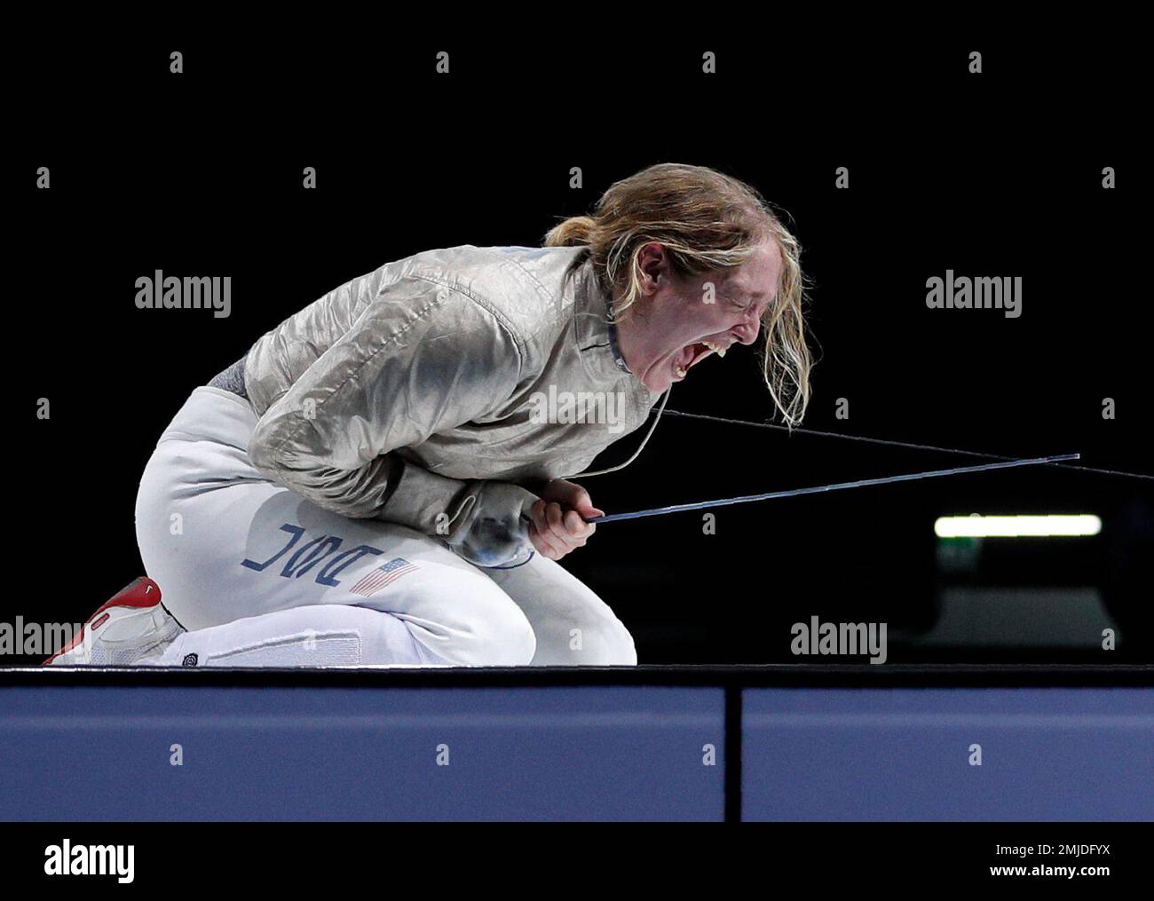 Anne-Elizabeth Stone of the U.S. screams in celebration as she wins the ...