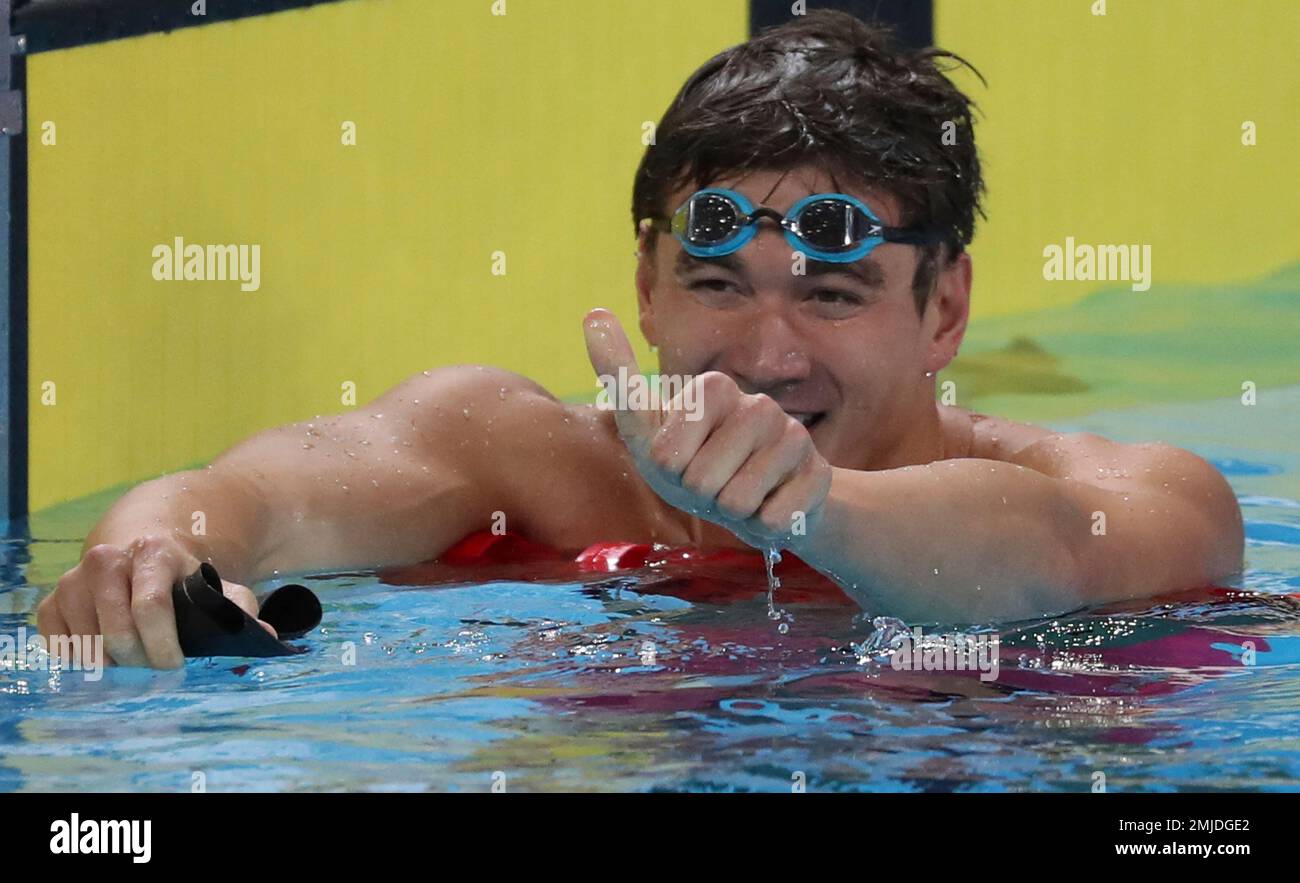 Nathan Adrian of the United States gives a thumbs up after winning the ...
