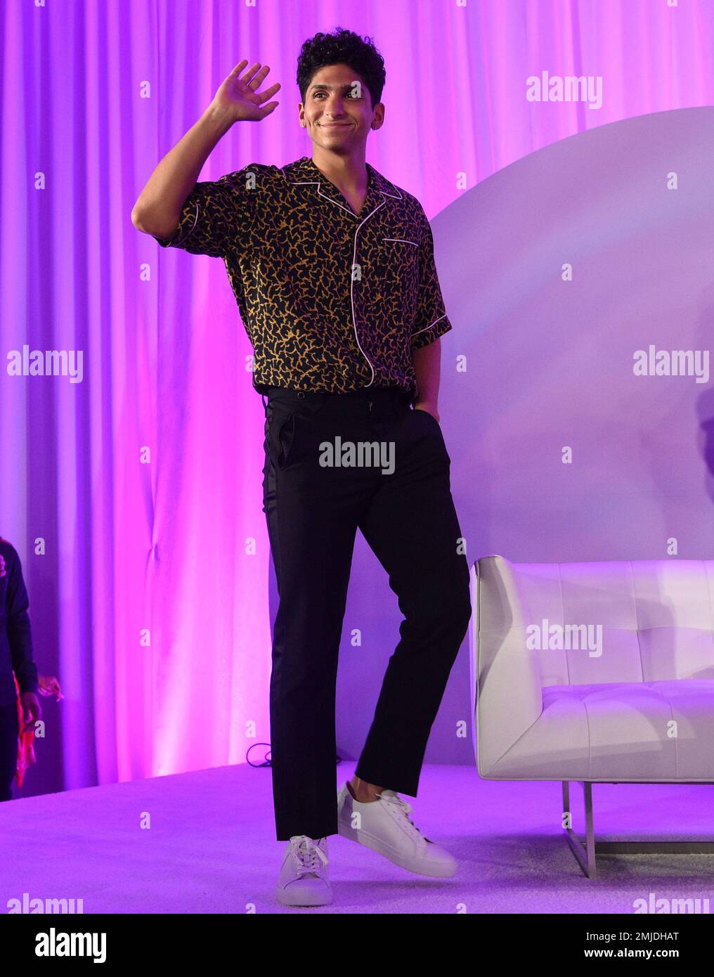 Angel Bismark Curiel walks on stage before the "Televised Revolution ...