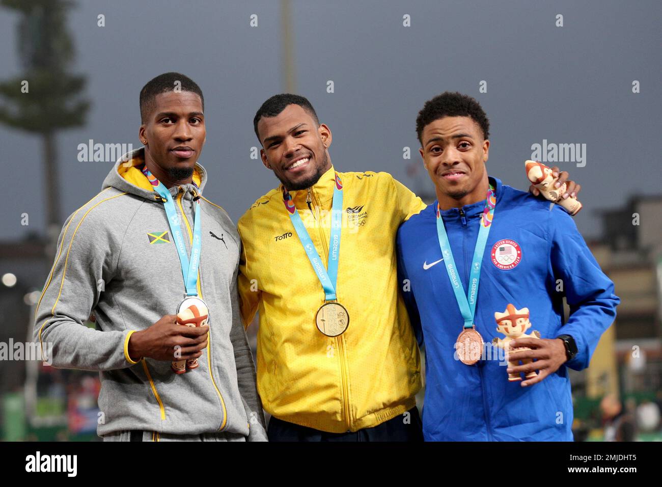 From left to right, silver medalist Demish, Gaye ofJamaica, gold ...