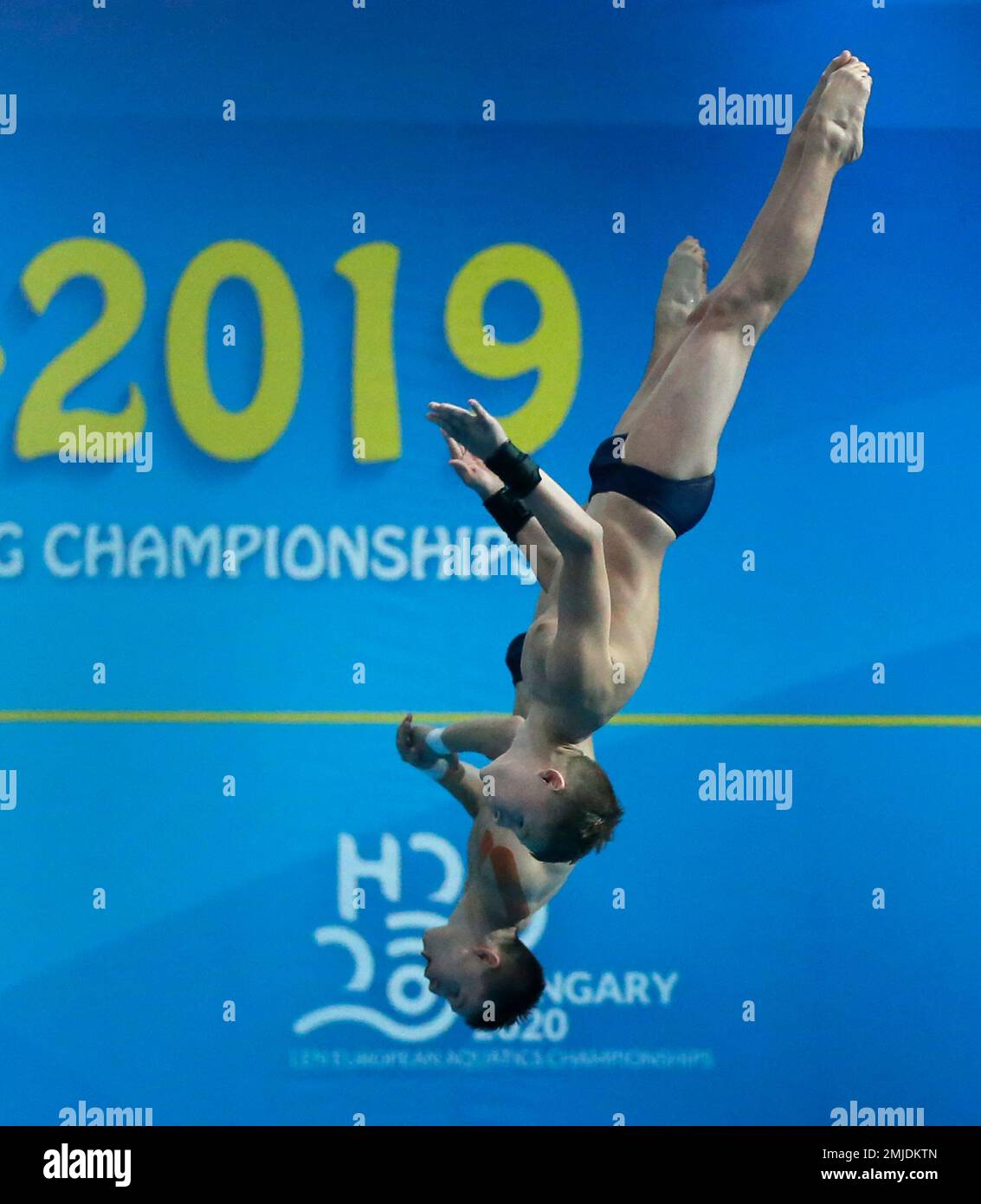 Ukraine's Oleh Serbin and Oleksii Sereda compete on their way to win ...