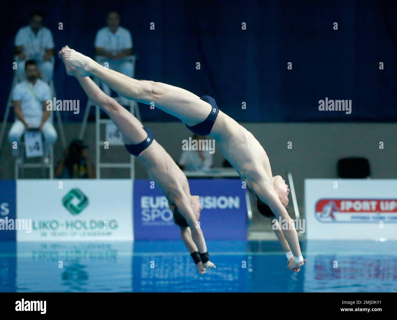 Ukraine's Oleh Serbin and Oleksii Sereda compete on their way to win ...