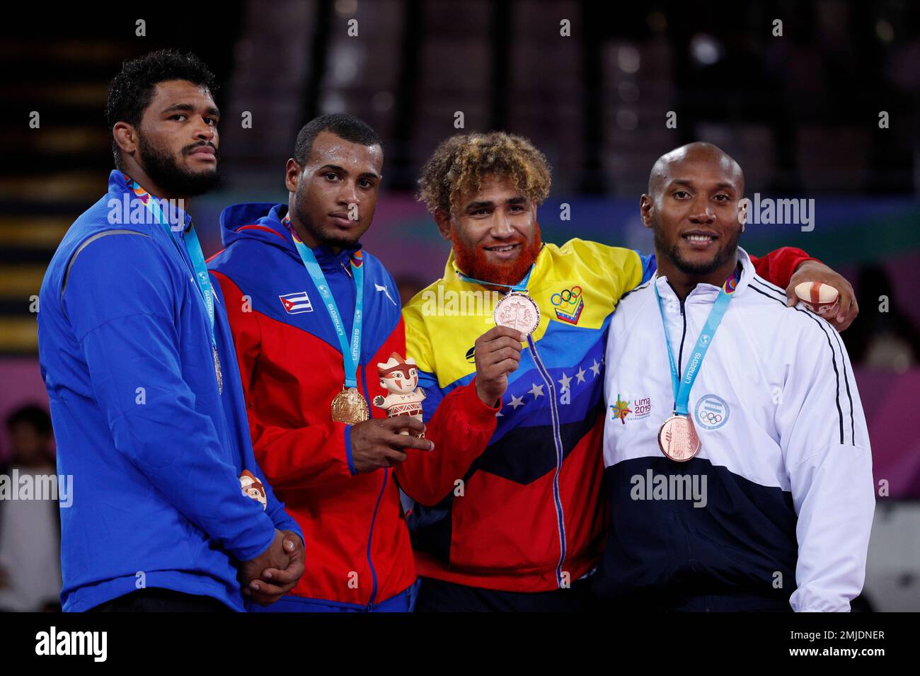 From left, silver medalist Tracy Hancock of the U.S., gold medalist ...