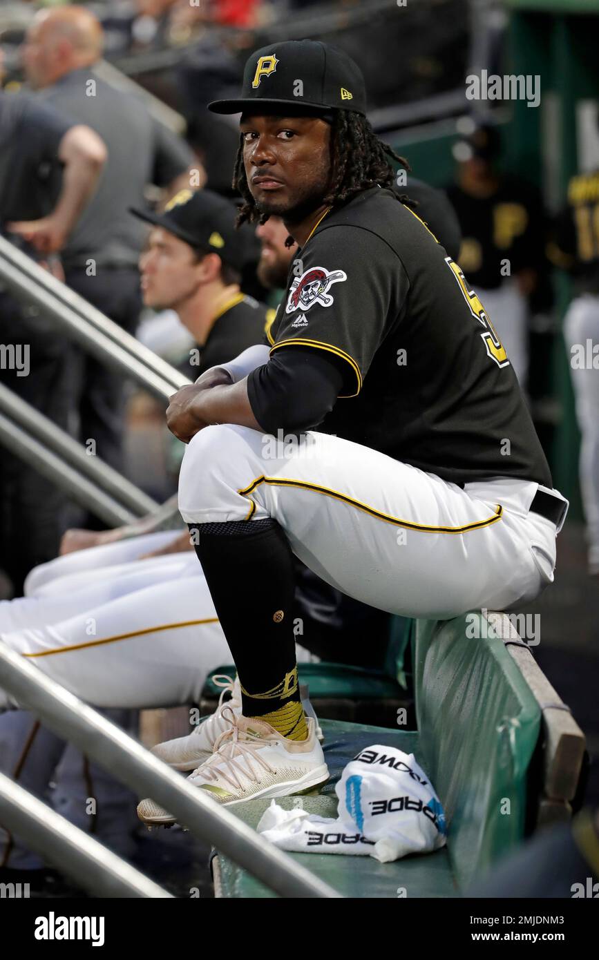 Pittsburgh Pirates' Josh Bell sits in the dugout during the fifth ...