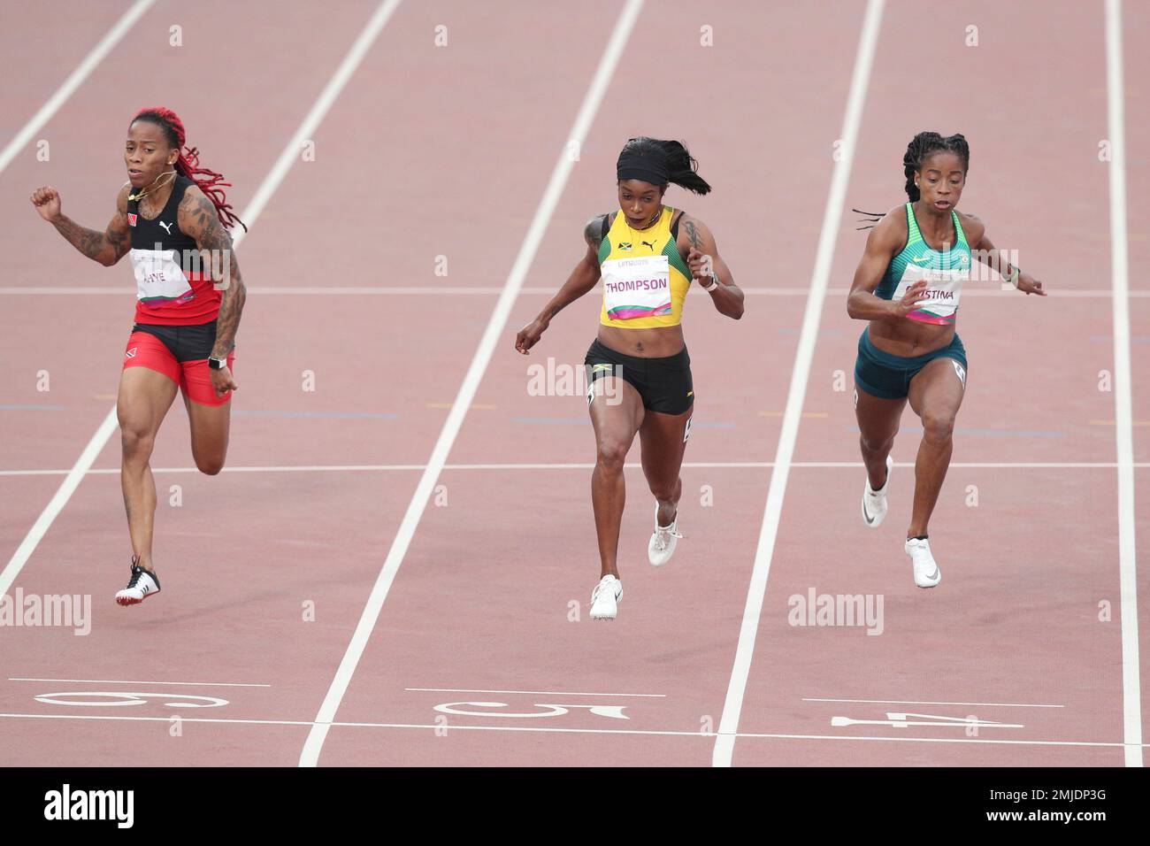 Elaine Thompson of Jamaica, center, wins the 100m final during the athletics at the Pan American ...