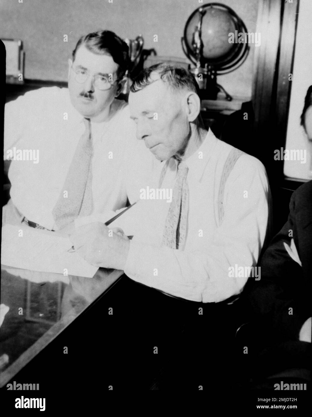 John Dillinger Sr., father of the notorious outlaw, and coroner Frank J ...
