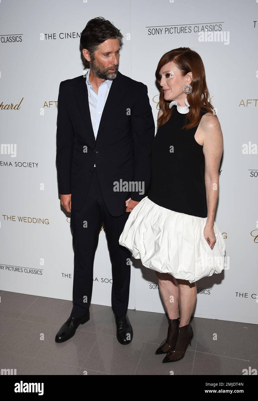 Director Bart Freundlich, left, and wife, actor Julianne Moore, attend ...