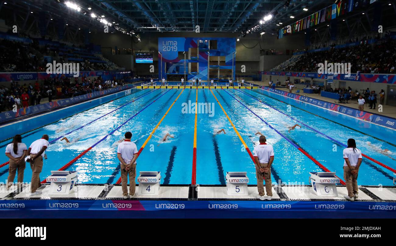 Athletes compete in men's swimming 400m freestyle swimming at the Pan ...