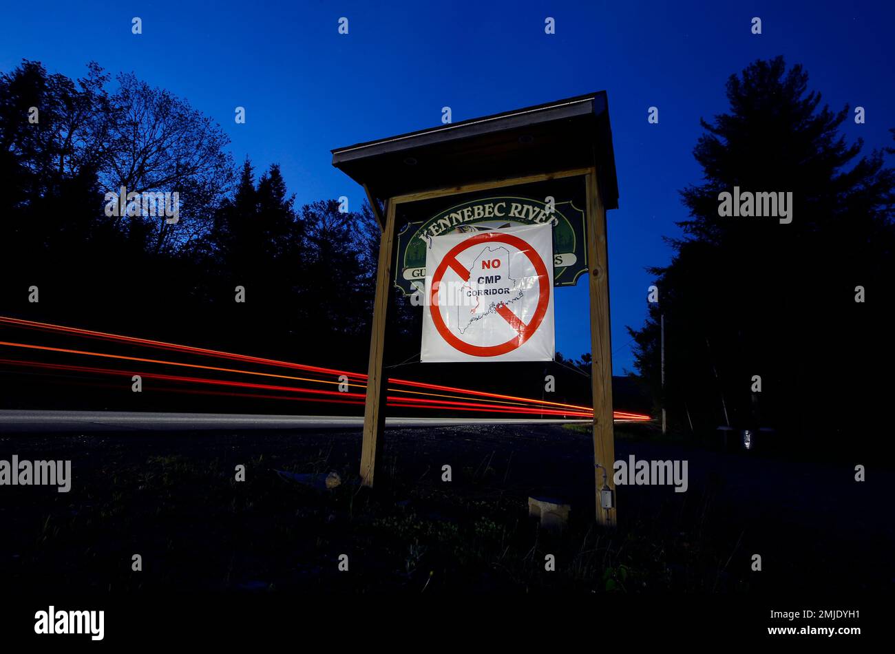 In this Tuesday, May 28, 2019 photo a sign in protest of Central Maine ...