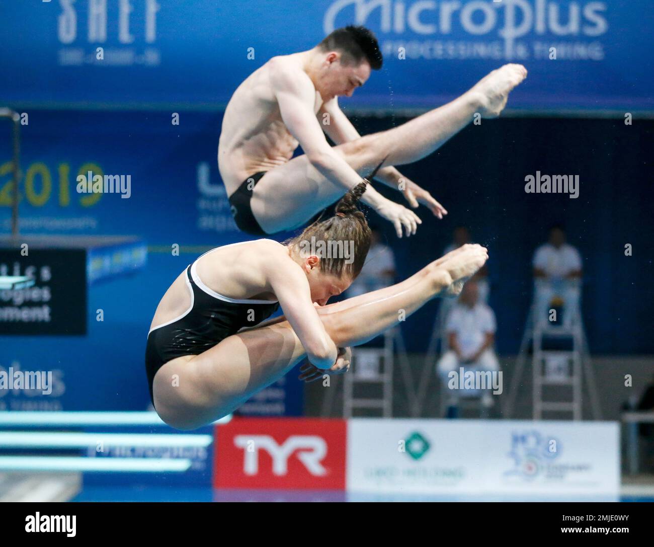 Germany's Tina Punzel and Lou Massenberg compete on their way to win ...