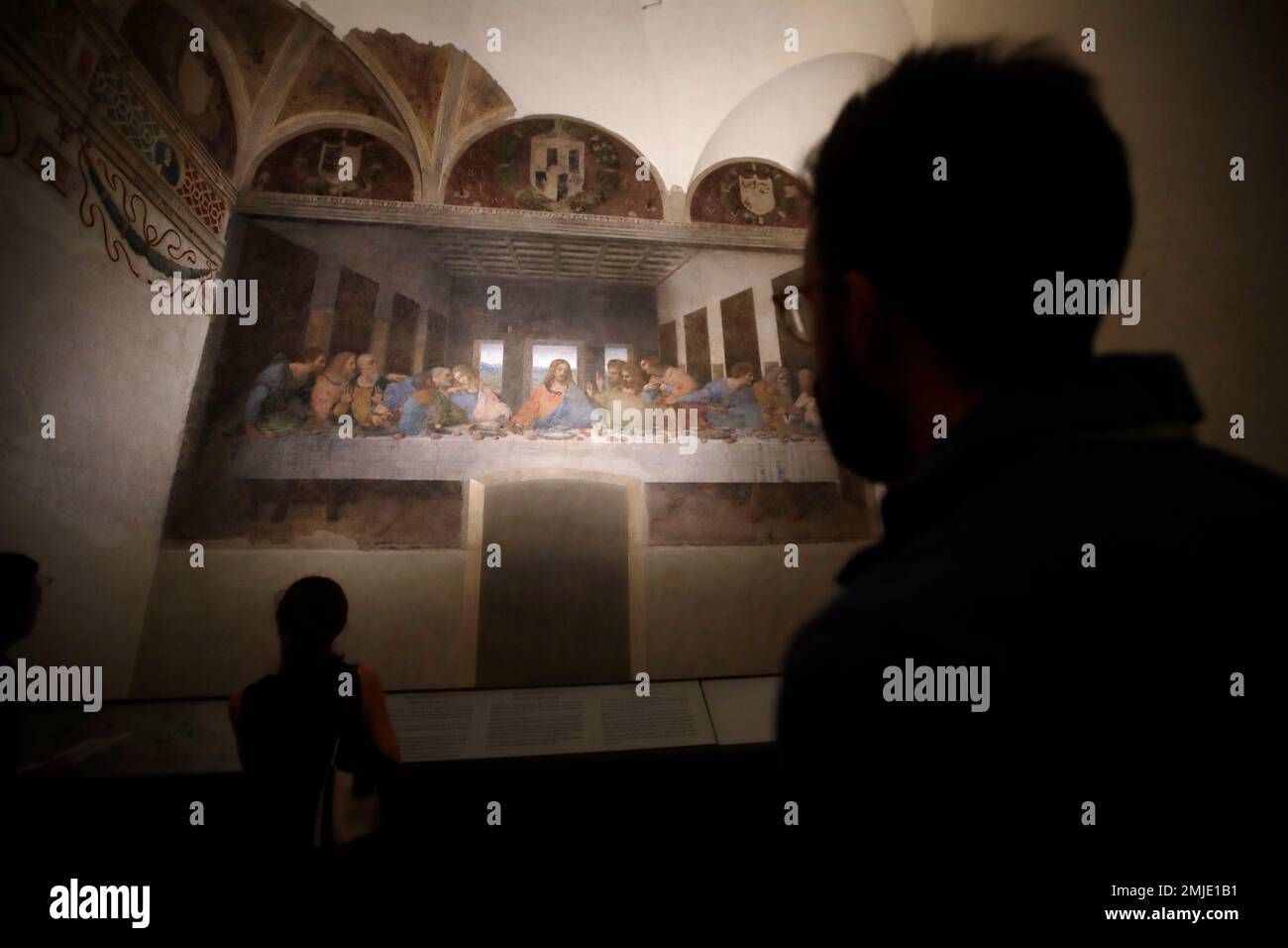 People admire the Leonardo da Vinci's paint 'Last Supper', dating back ...